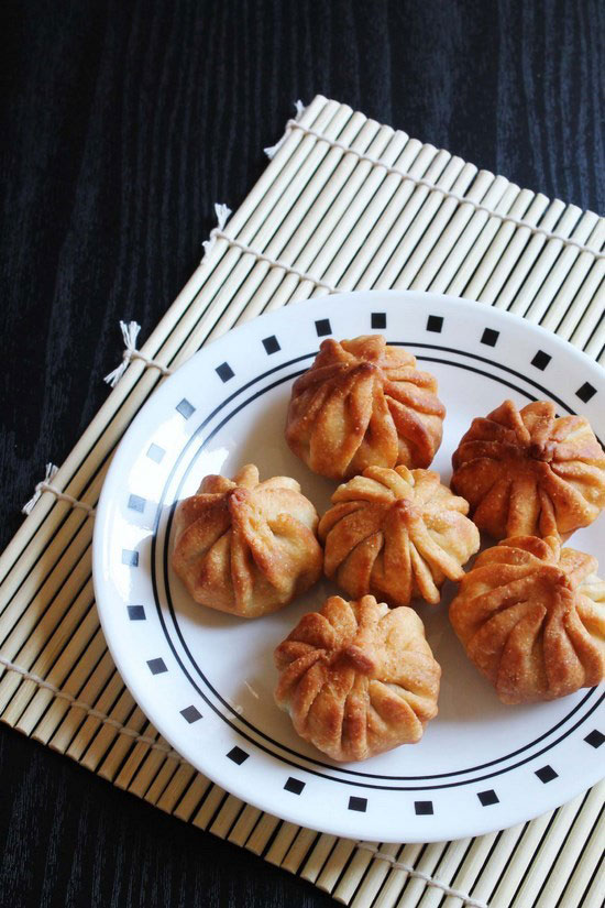 Fried Modak Recipe (Modak for Ganesh Chaturthi) - Spice Up The Curry